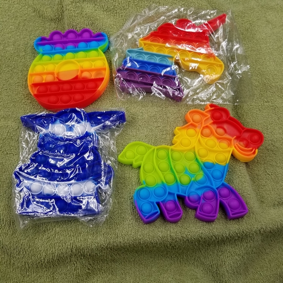 Pop It | Toys | Pop It Fidget Toys Nwot Bundle Of Four Pony Unicorn ...